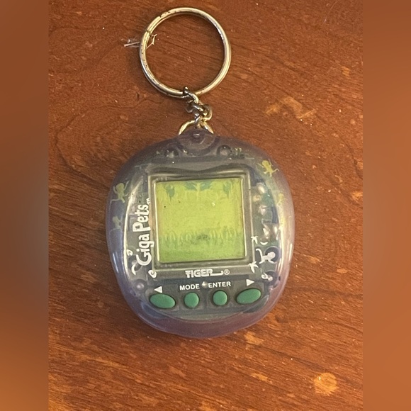 Tiger Electronics | Other | Giga Pets Virtual Micro Chimp Pet Keychain ...